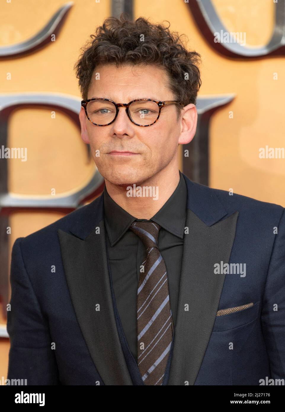 London, UK. Richard Coyle at the 'Fantastic Beasts: The Secret of ...