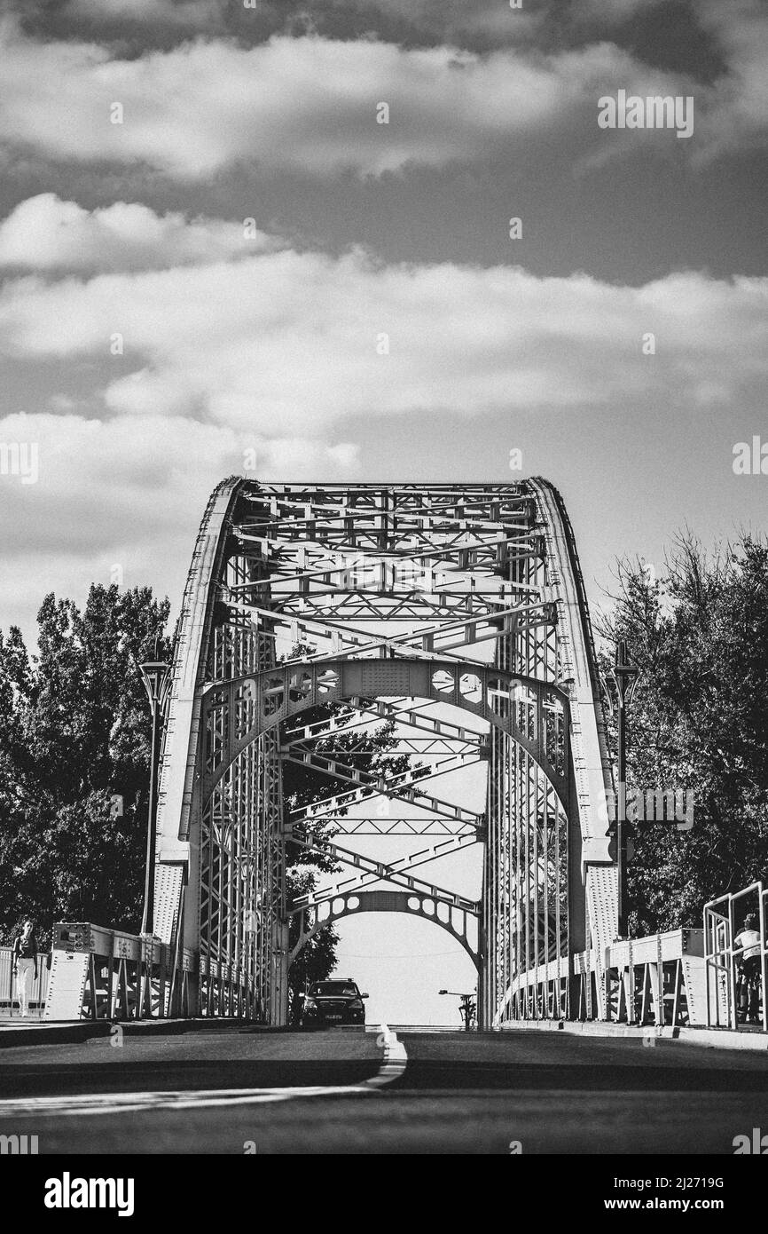 a low angle shot of bridge in grayscale Stock Photo - Alamy