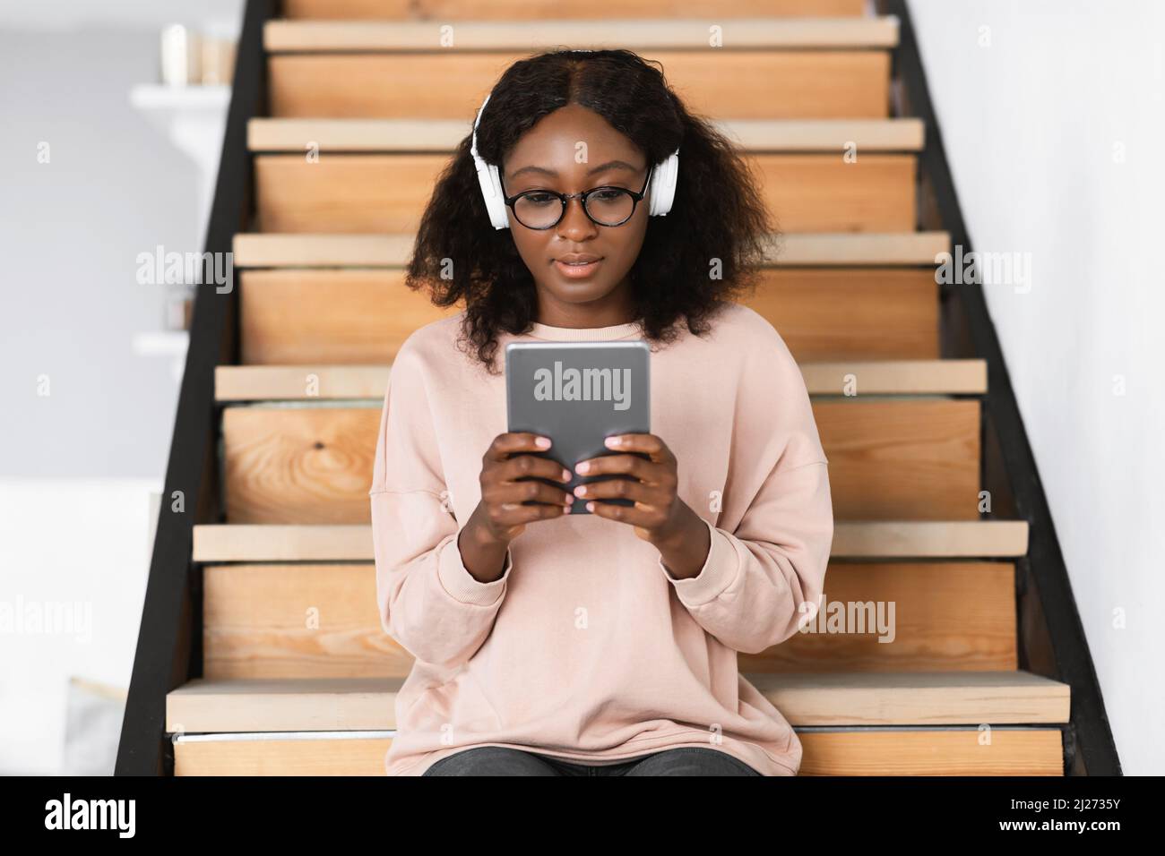 African American Student Lady Using Digital Tablet At Home Stock Photo ...
