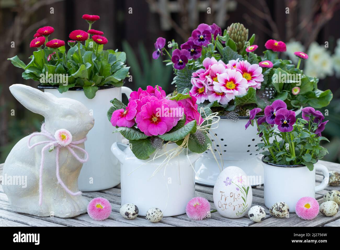 easter decoration with easter bunny and pink spring flowers in vintage ...