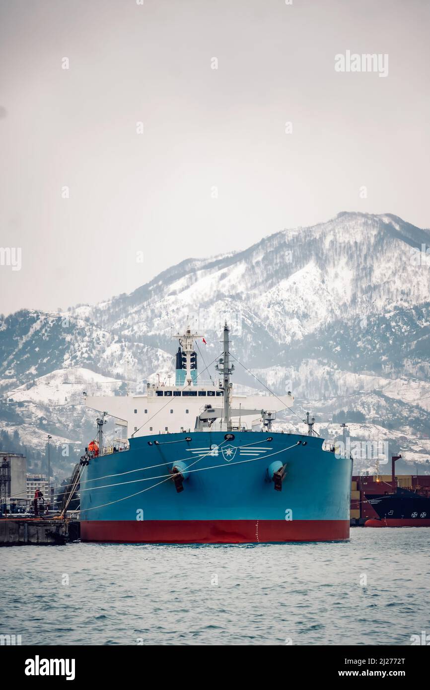Close-up of a beautiful ship in a seaport against the backdrop of snow ...
