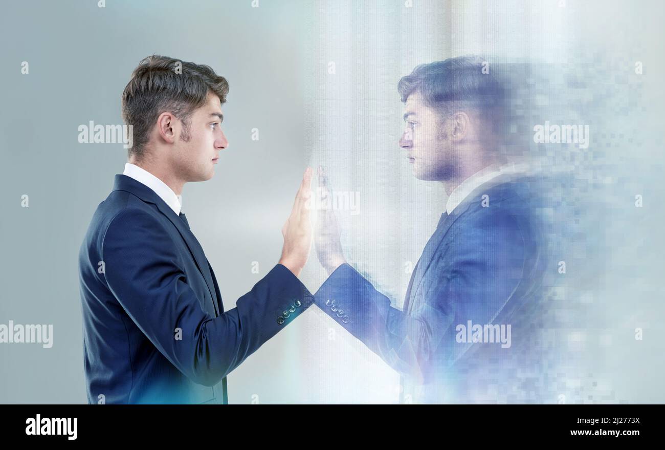 Reaching out to myself.... Cropped conceptual shot of a handsome young ...