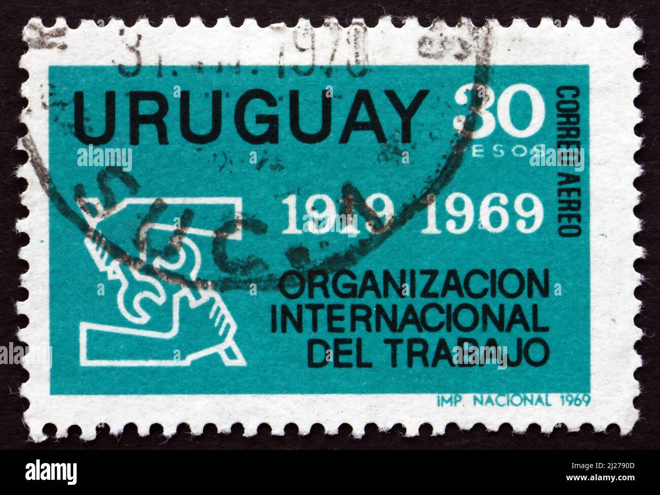 URUGUAY - CIRCA 1969: a stamp printed in the Uruguay shows ILO Emblem ...