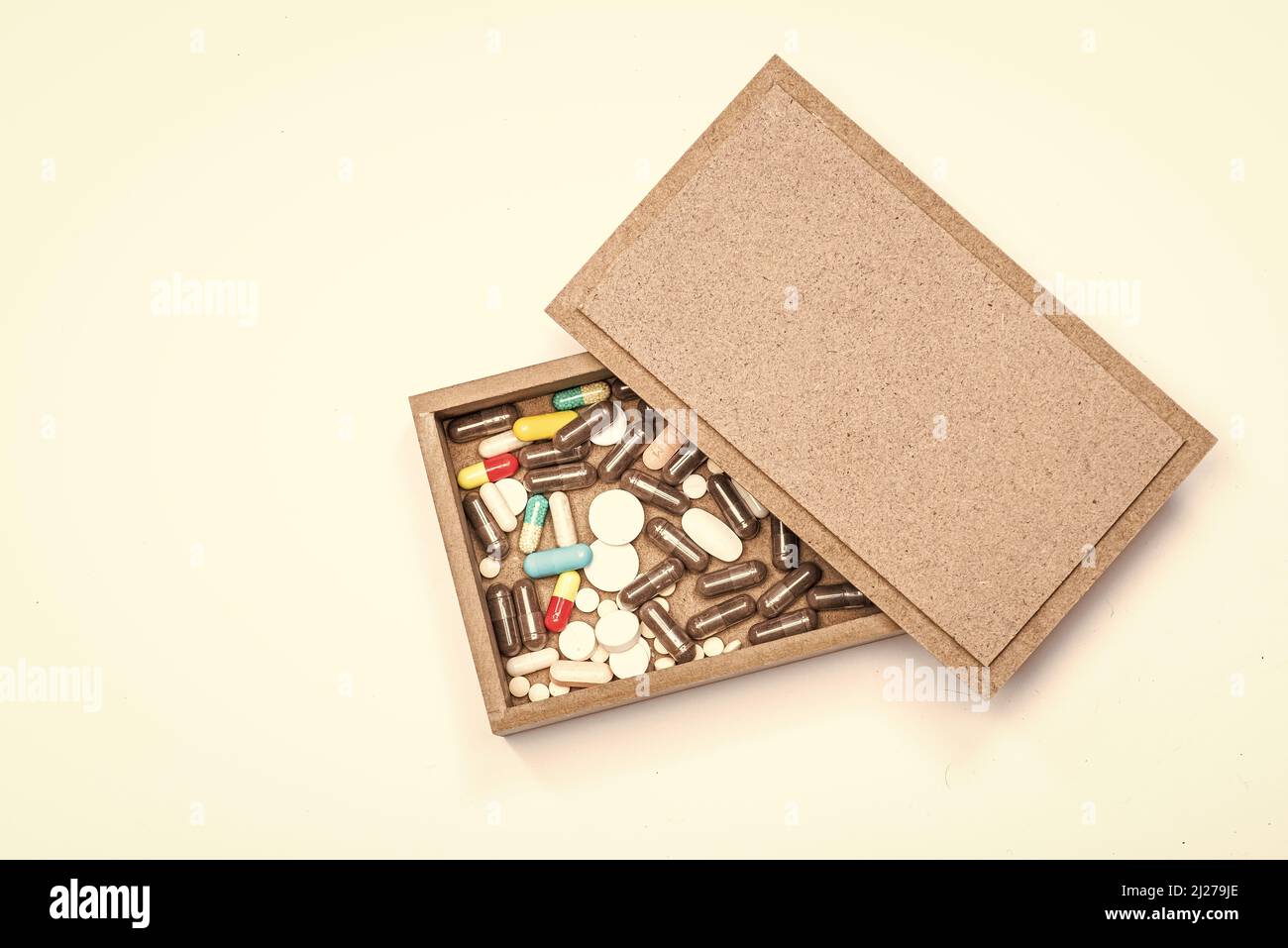 Advanced medicine for pain. Pill case isolated on white. Open pill box ...