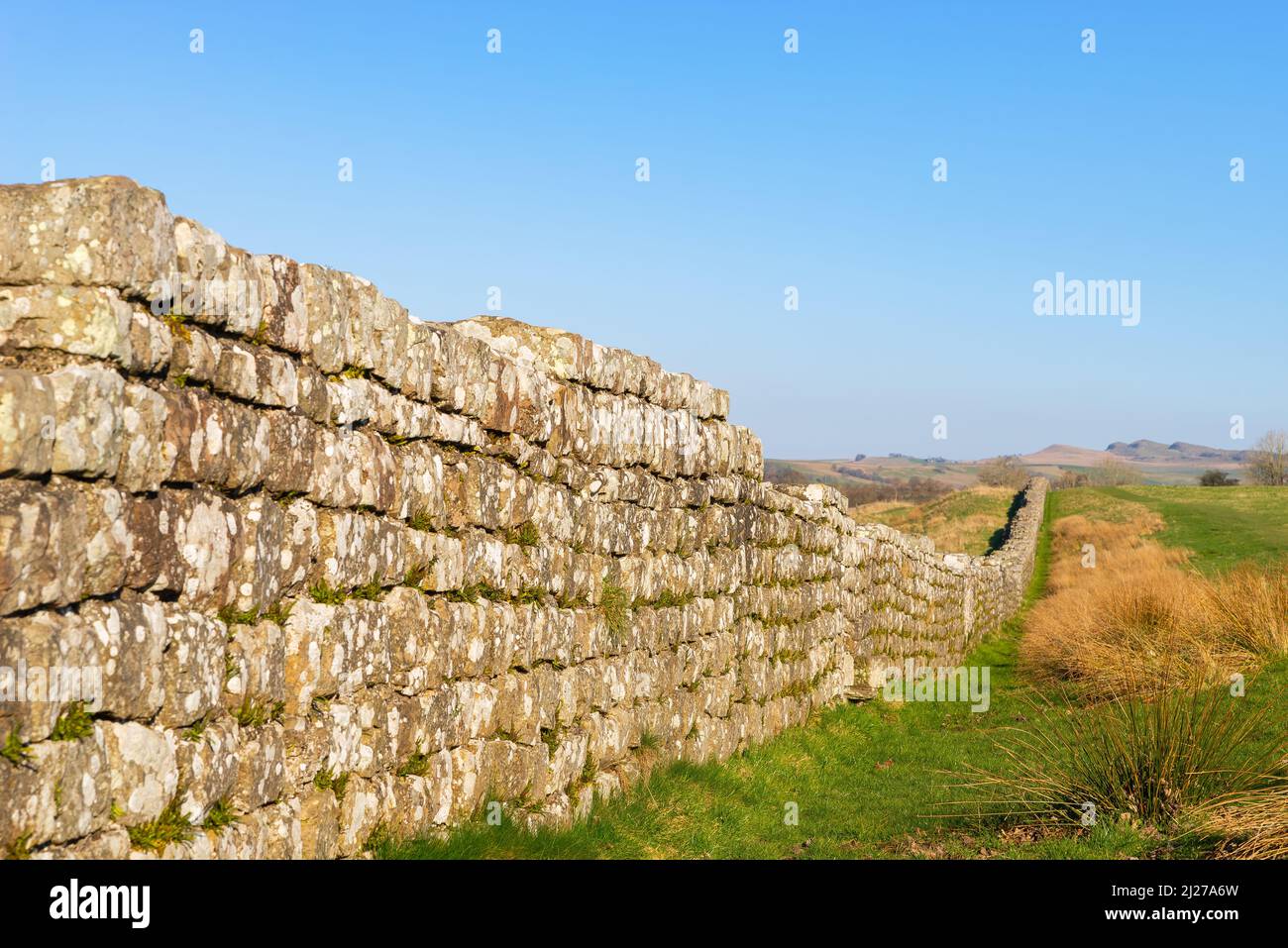 Remains of Hadrian's Wall, built in 122 AD, in the afternoon light ...