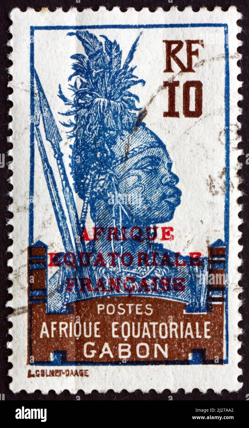 GABON - CIRCA 1926: a stamp printed in the Gabon shows Fang Warrior ...