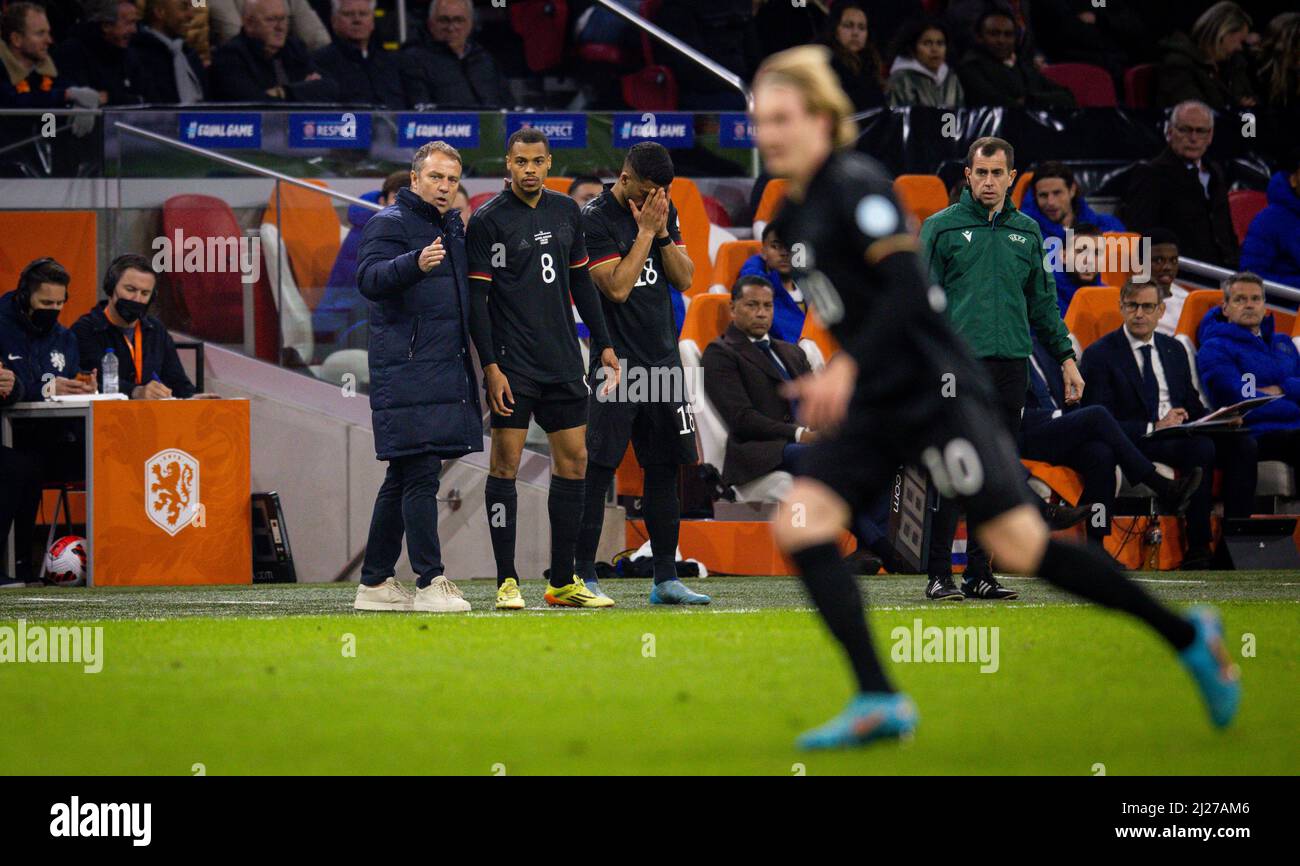 Trainer Hansi Flick (Deutschland), Lukas Nmecha (Deutschland), Benjamin ...