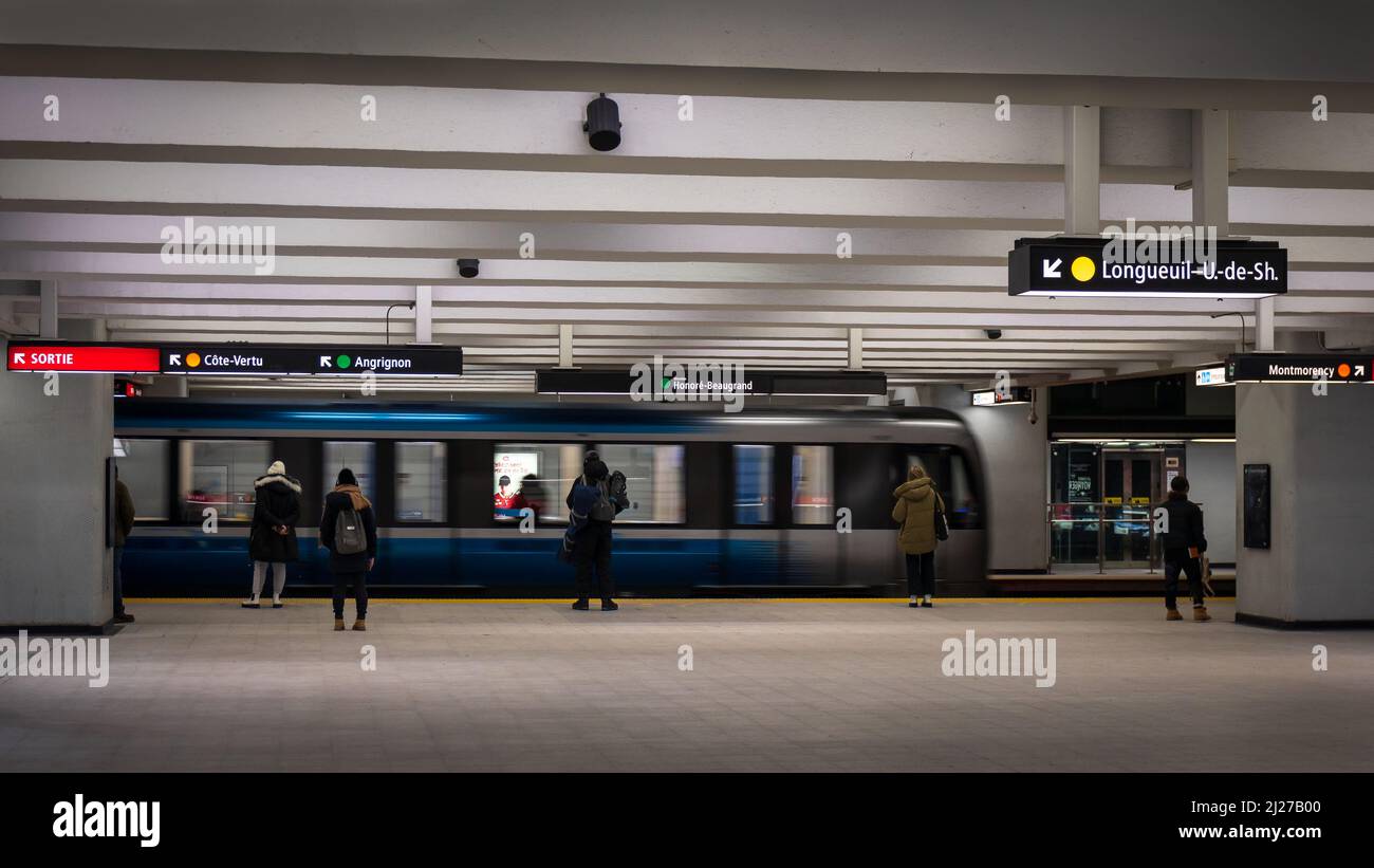 Berry-UQAM station of the Montréal metro, people in motion Stock Photo ...