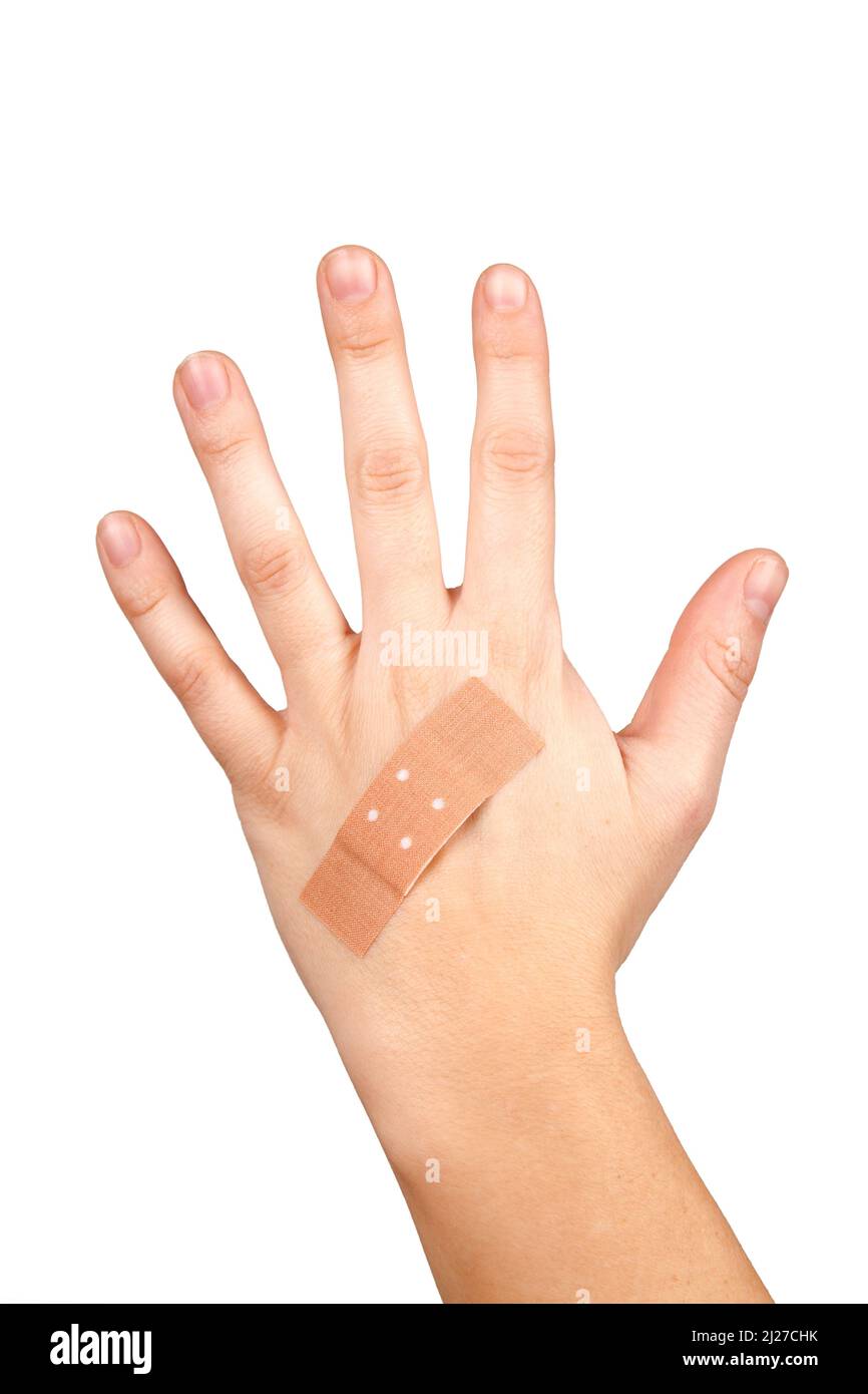 A closeup of a human's hand covered with a bandage on a white ...