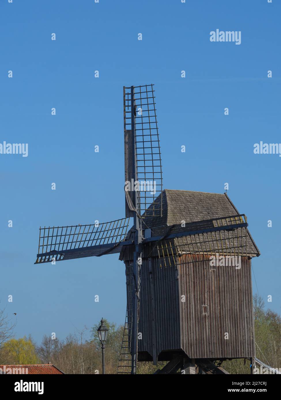 windmill and church in westphalia Stock Photo - Alamy