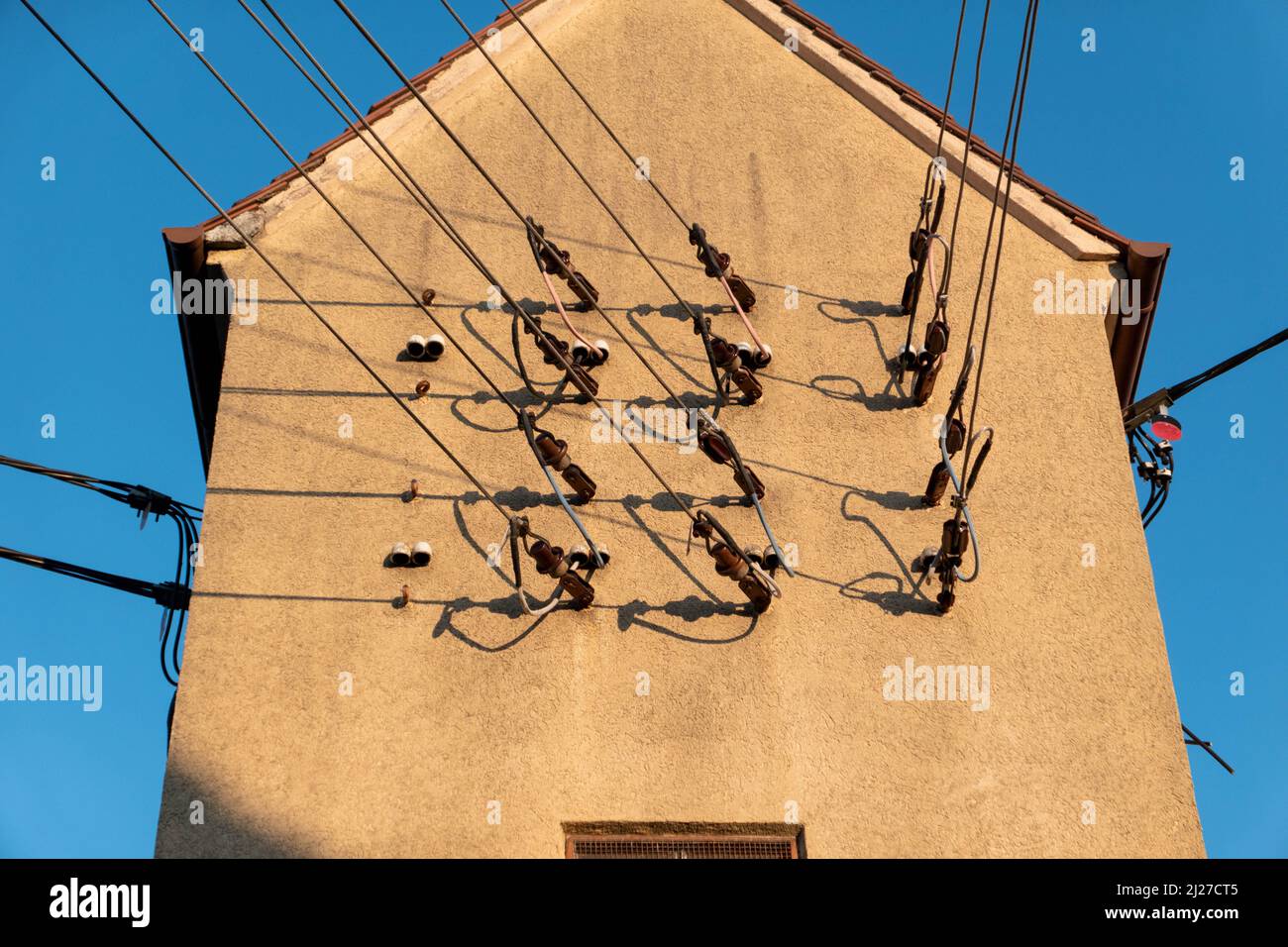 Old electricity distribution tower with connections Stock Photo - Alamy