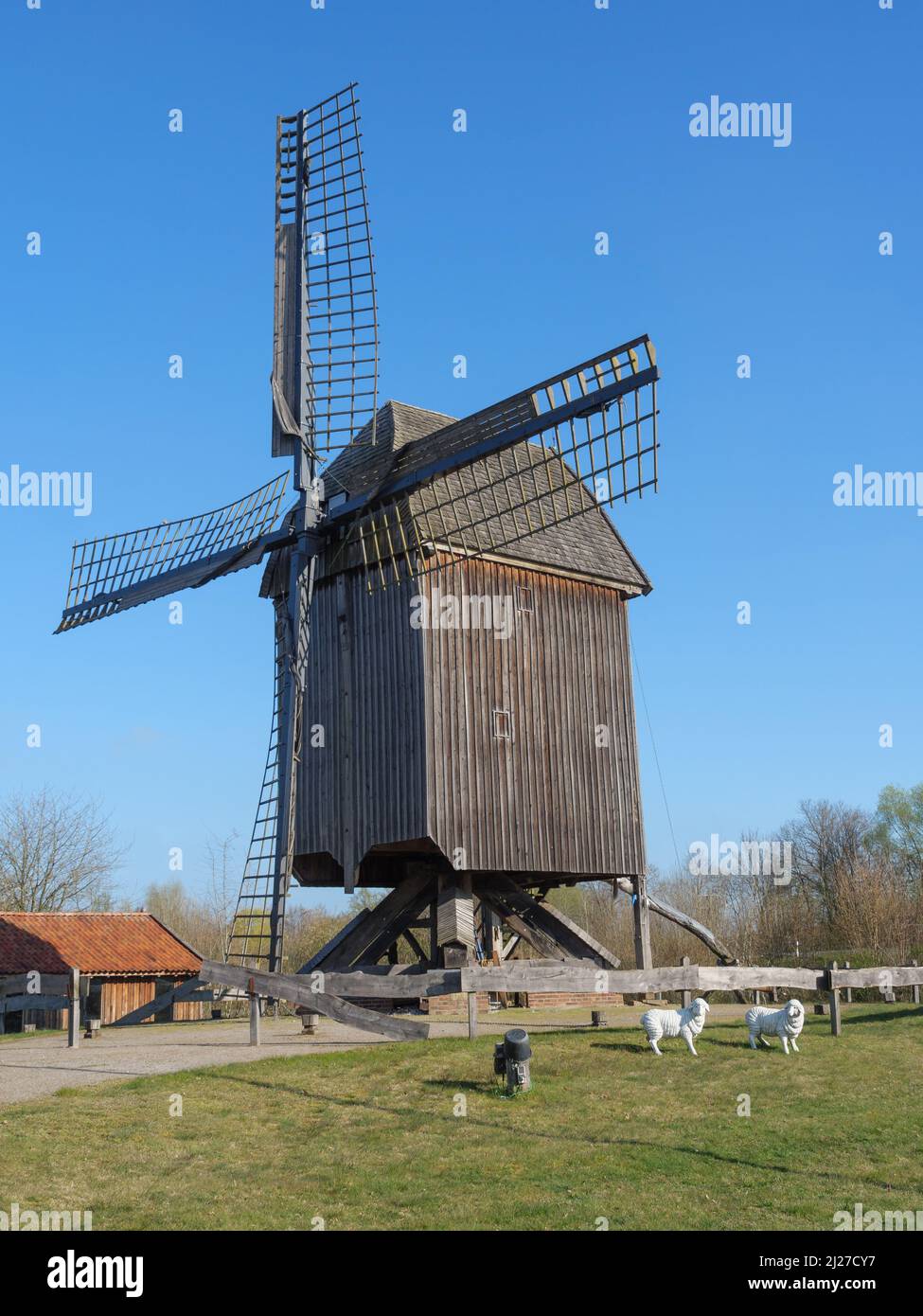 windmill and church in westphalia Stock Photo - Alamy