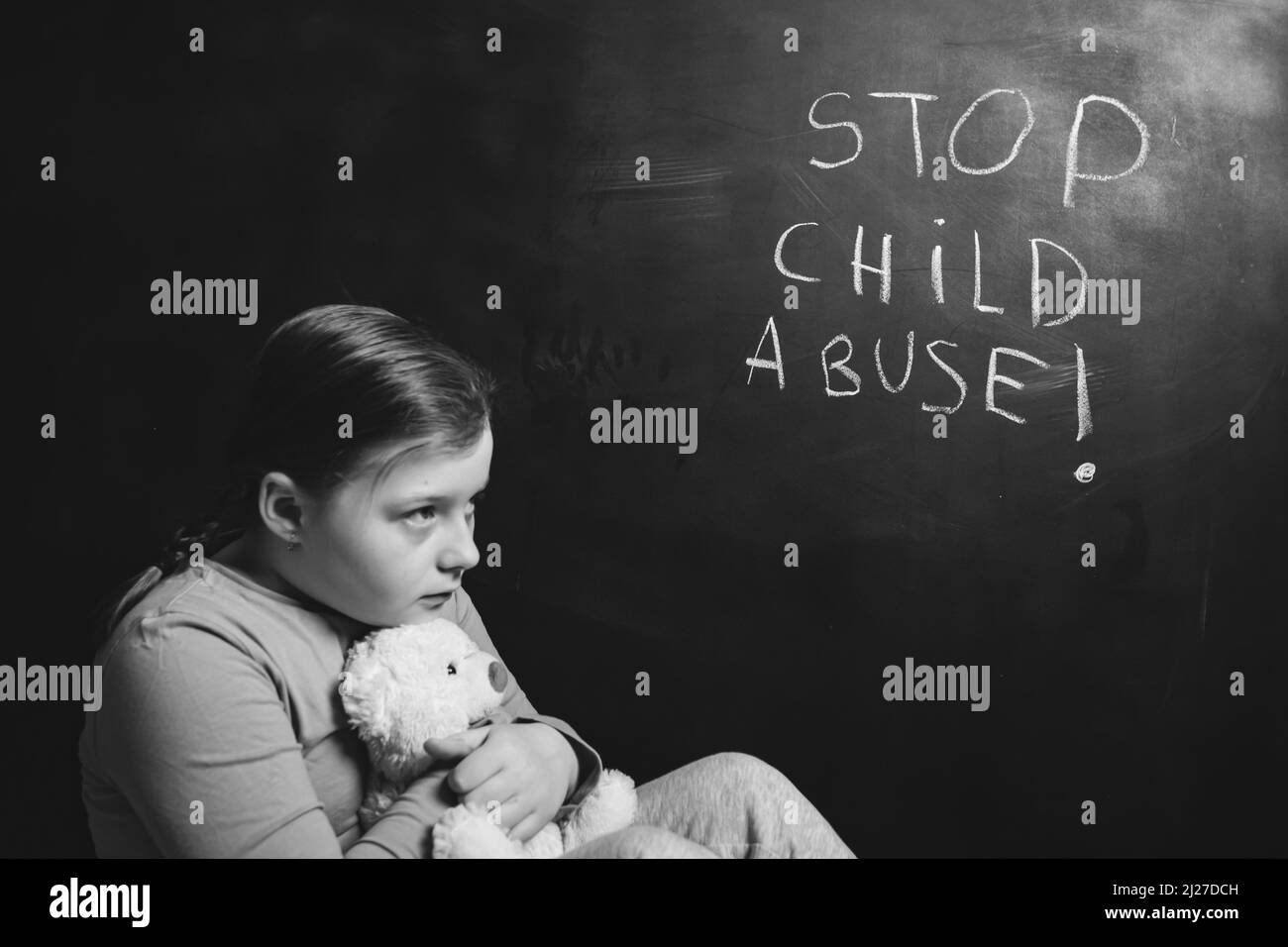 Child violence and abused concept. Little sad girl with Stop child ...