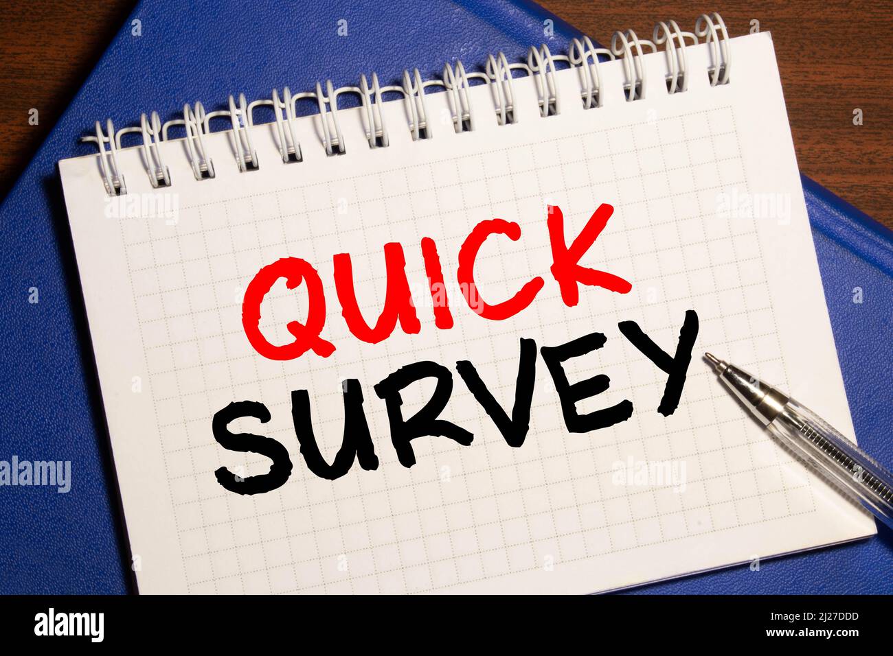 Quick Survey text written on a notebook with pencils Stock Photo - Alamy