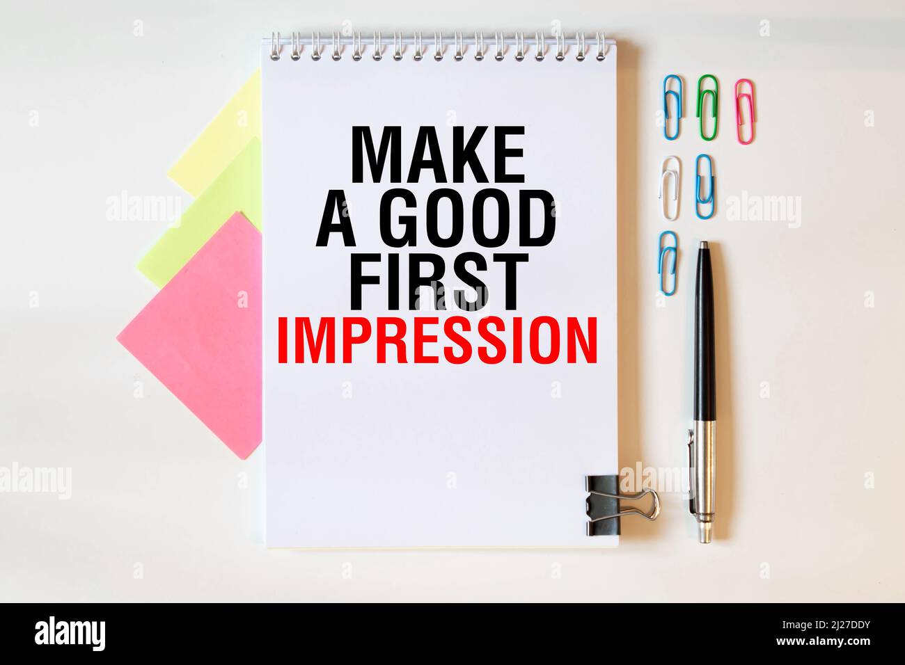 Text Make a good first impression on notebook page Stock Photo - Alamy