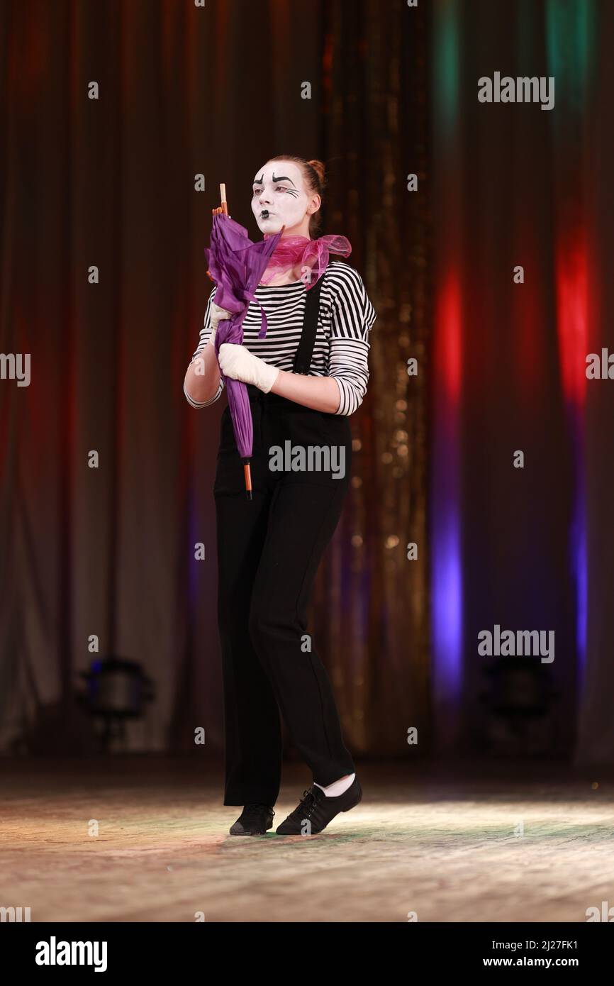 Actress girls clowns show performance on stage Stock Photo - Alamy