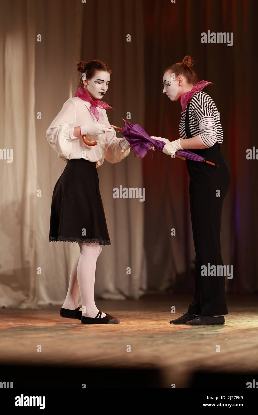 Actress girls clowns show performance on stage Stock Photo - Alamy