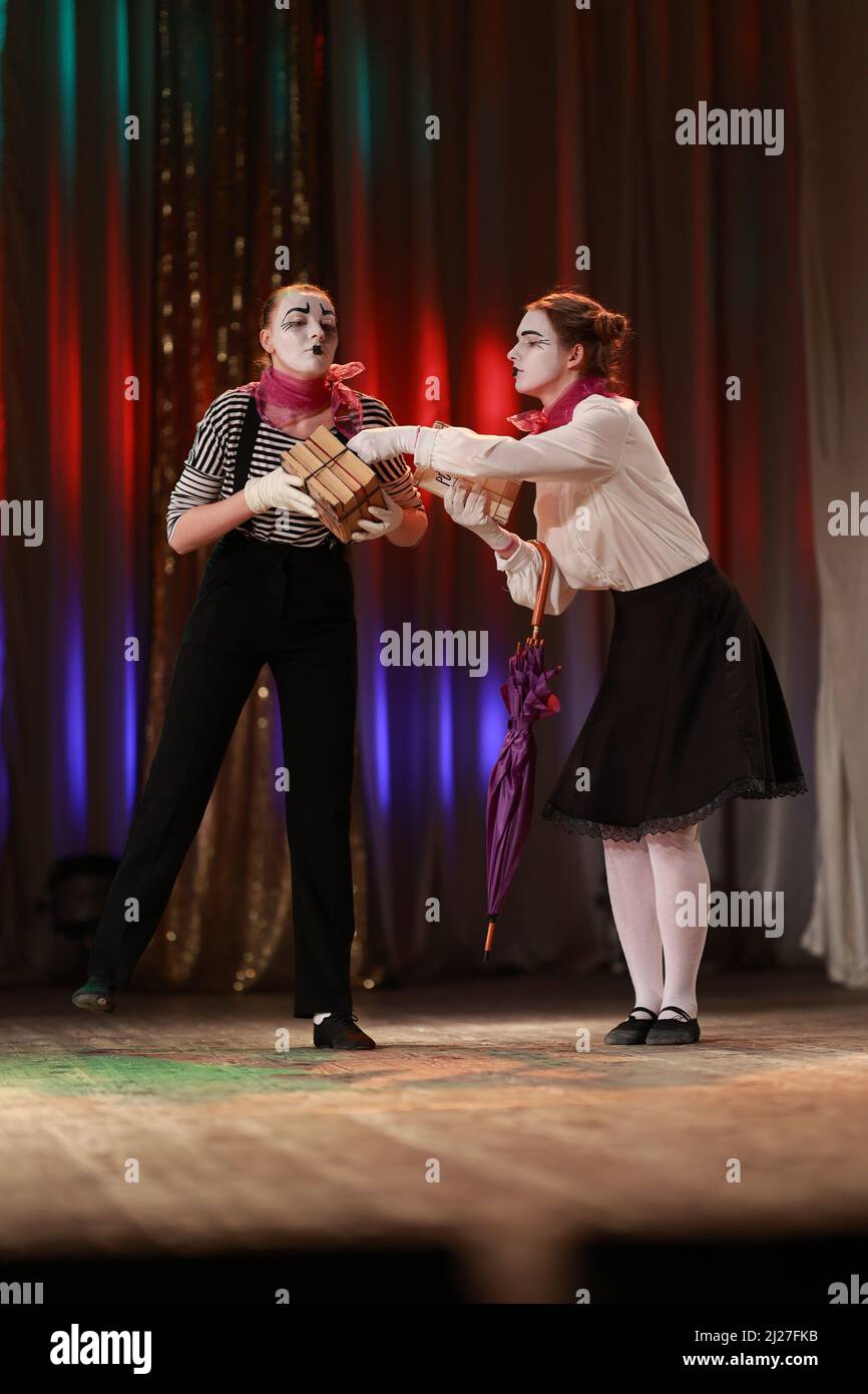 Actress girls clowns show performance on stage Stock Photo - Alamy