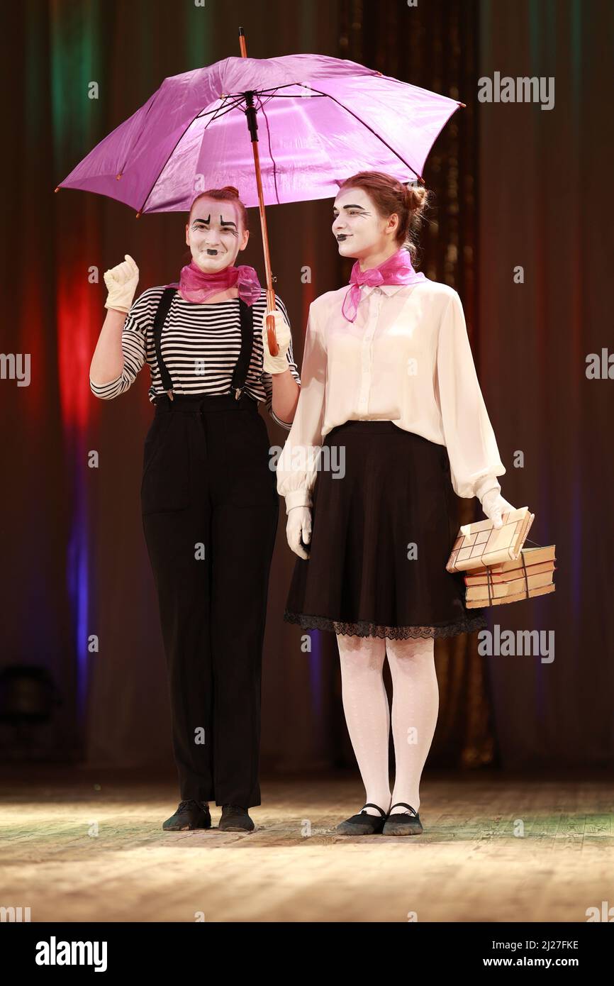 Actress girls clowns show performance on stage Stock Photo - Alamy