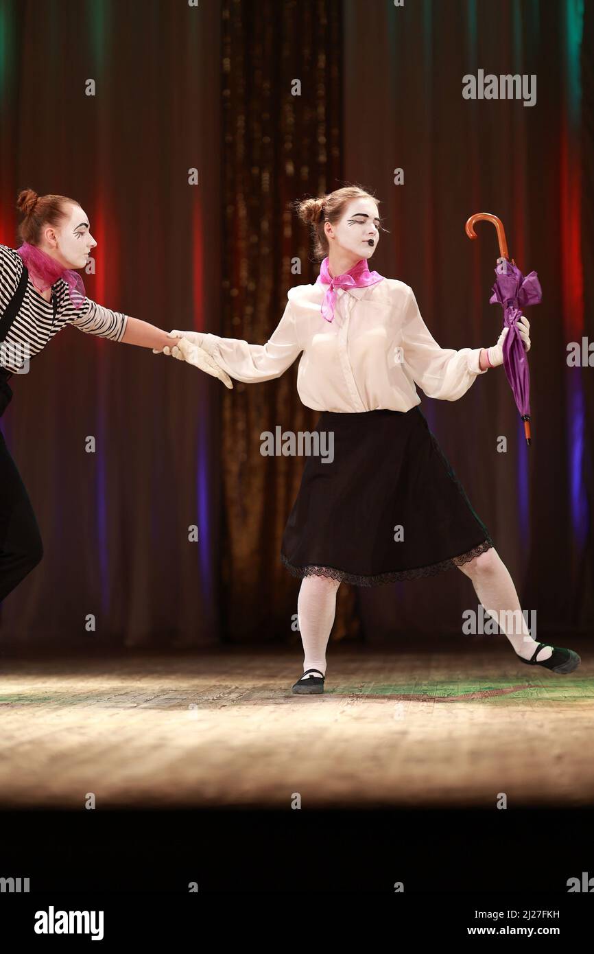 Actress girls clowns show performance on stage Stock Photo - Alamy