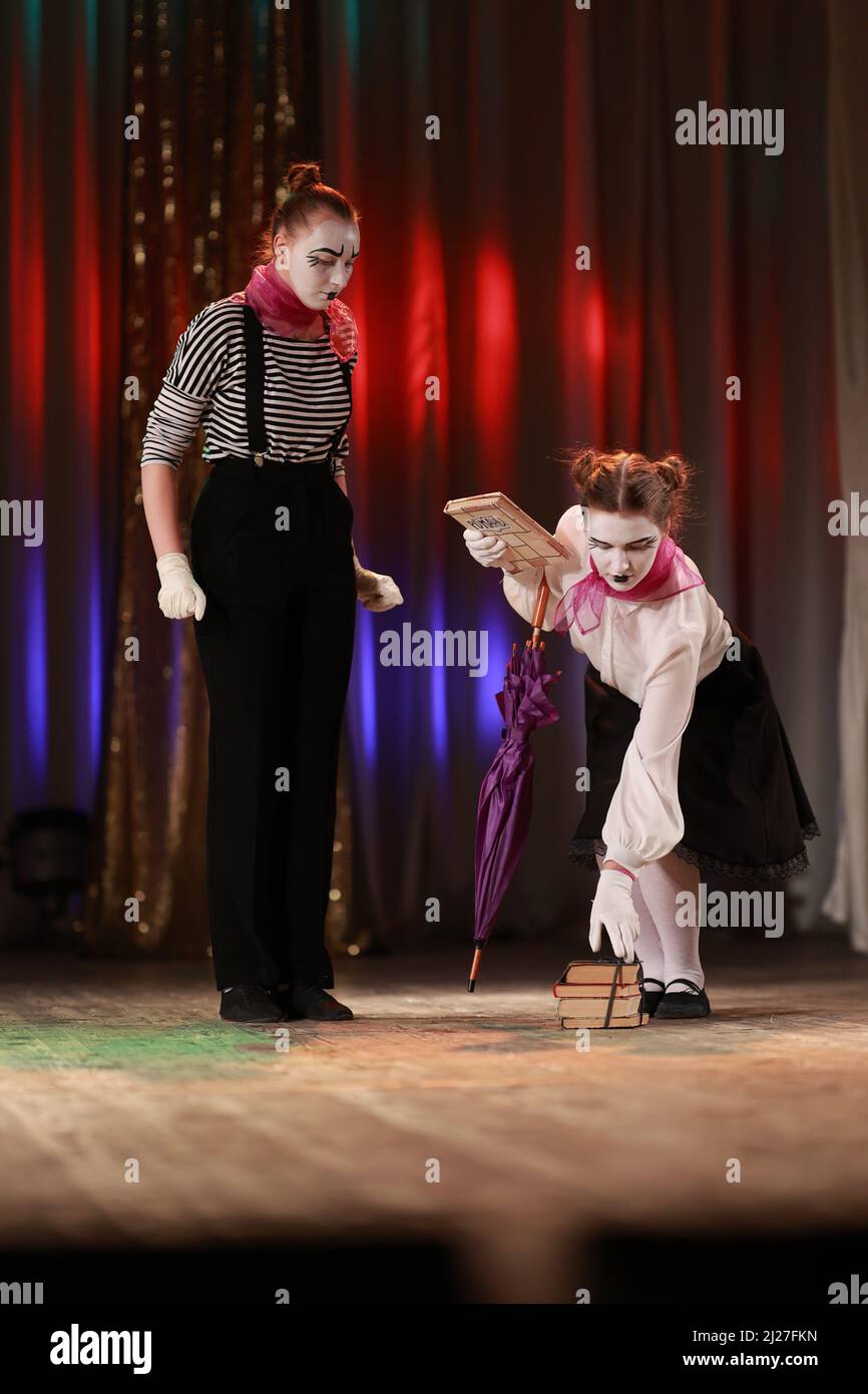 Actress girls clowns show performance on stage Stock Photo - Alamy