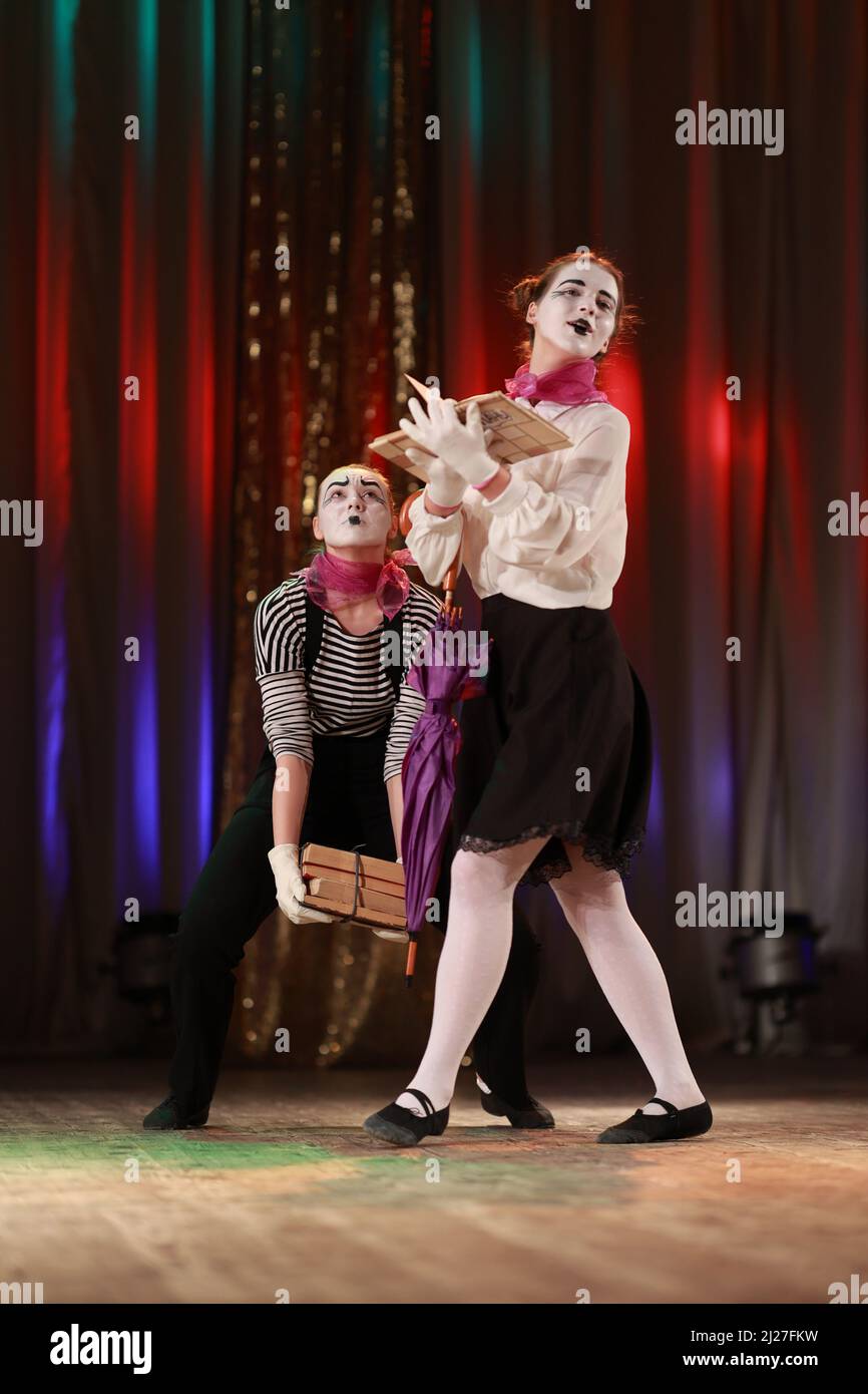 Actress girls clowns show performance on stage Stock Photo - Alamy