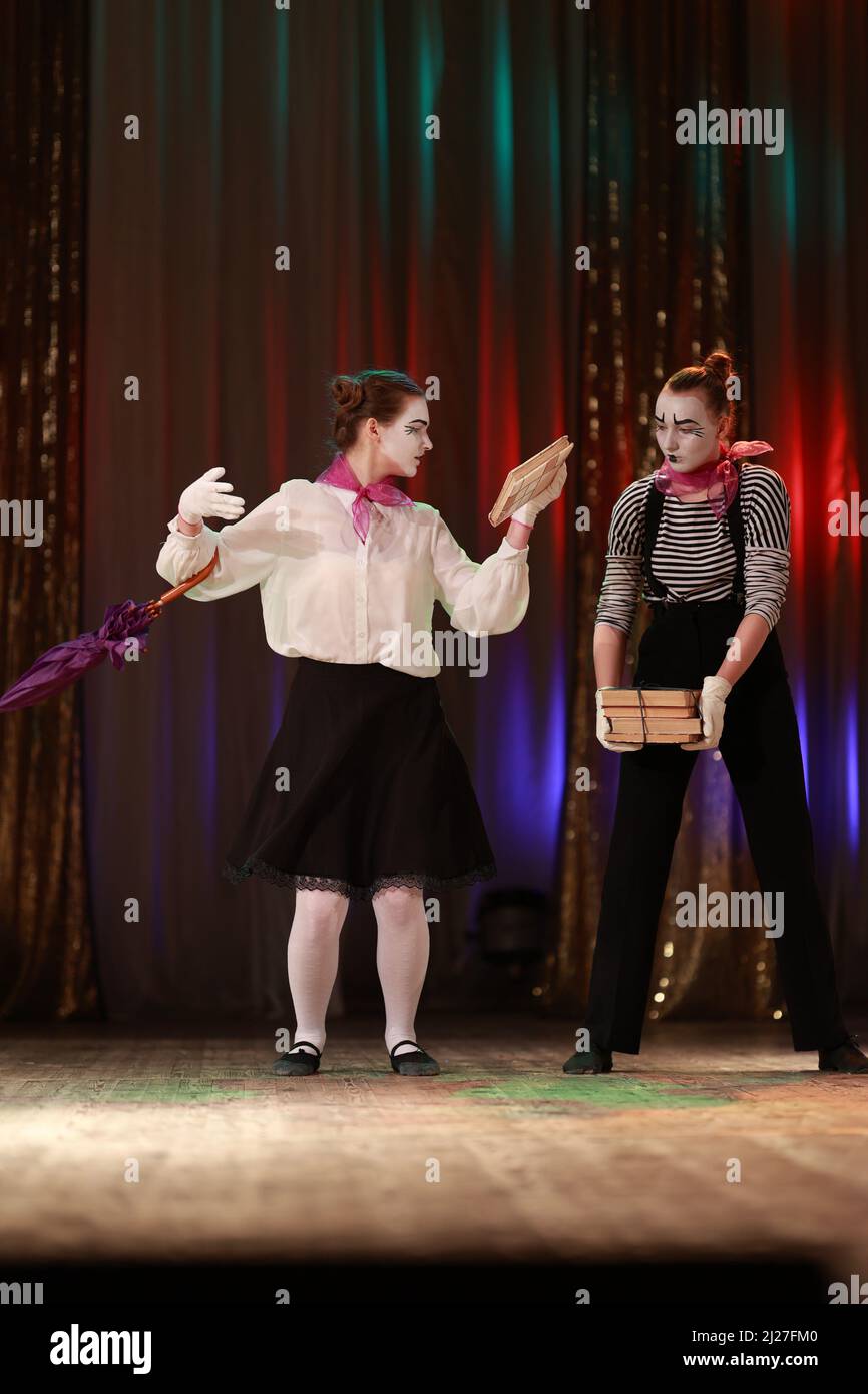 Actress girls clowns show performance on stage Stock Photo - Alamy