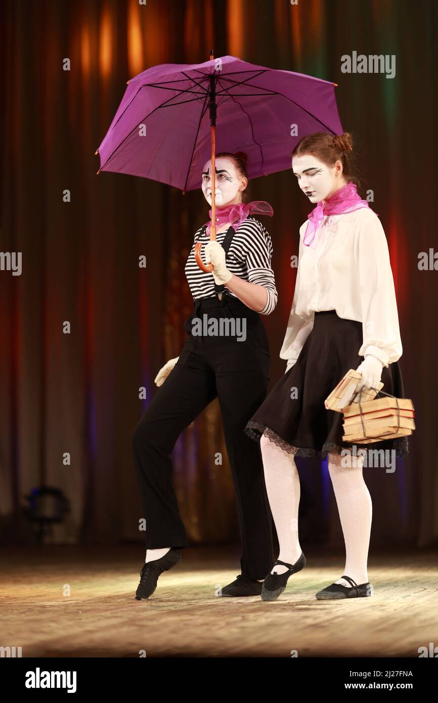 Actress girls clowns show performance on stage Stock Photo - Alamy
