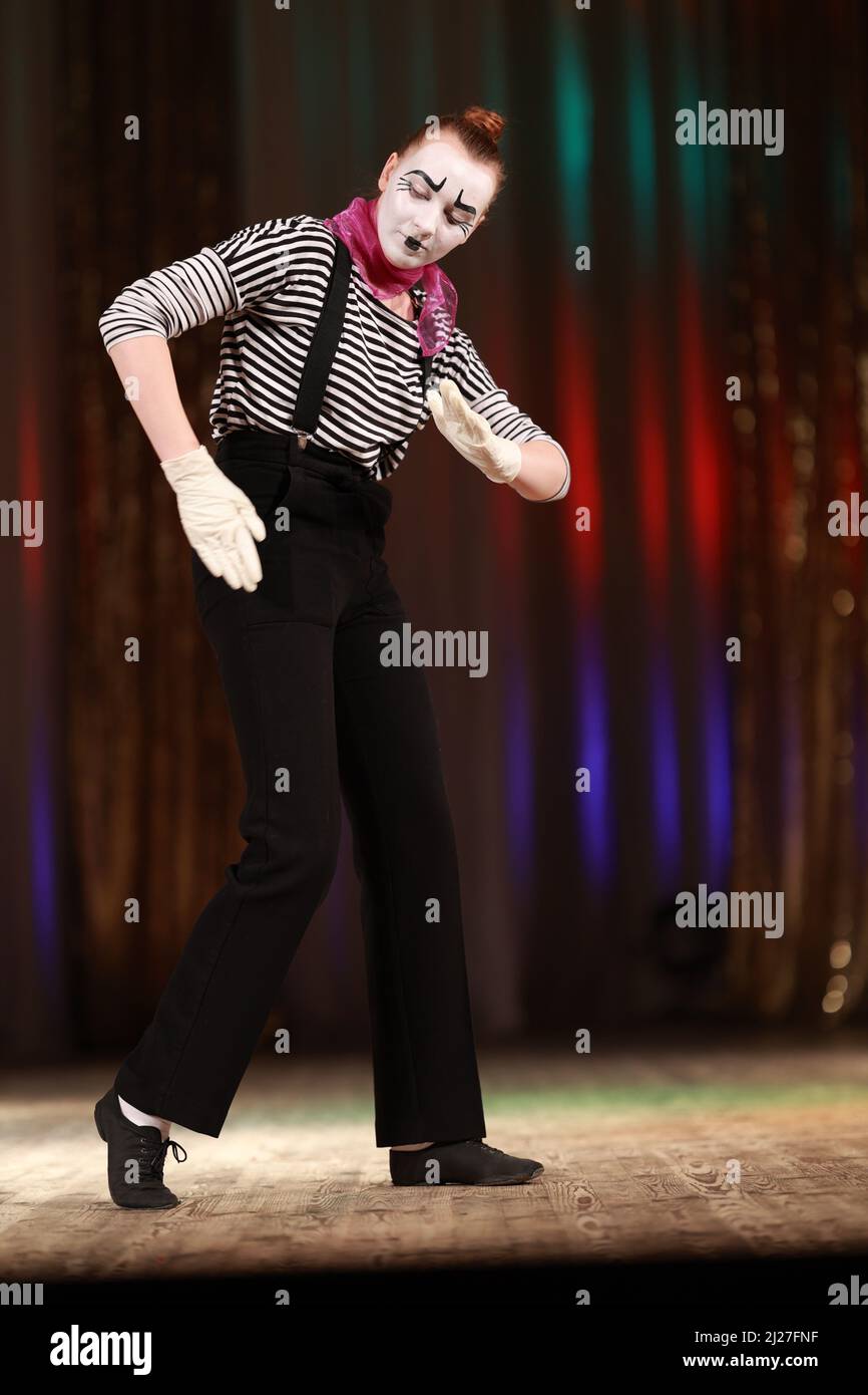 Actress girls clowns show performance on stage Stock Photo - Alamy