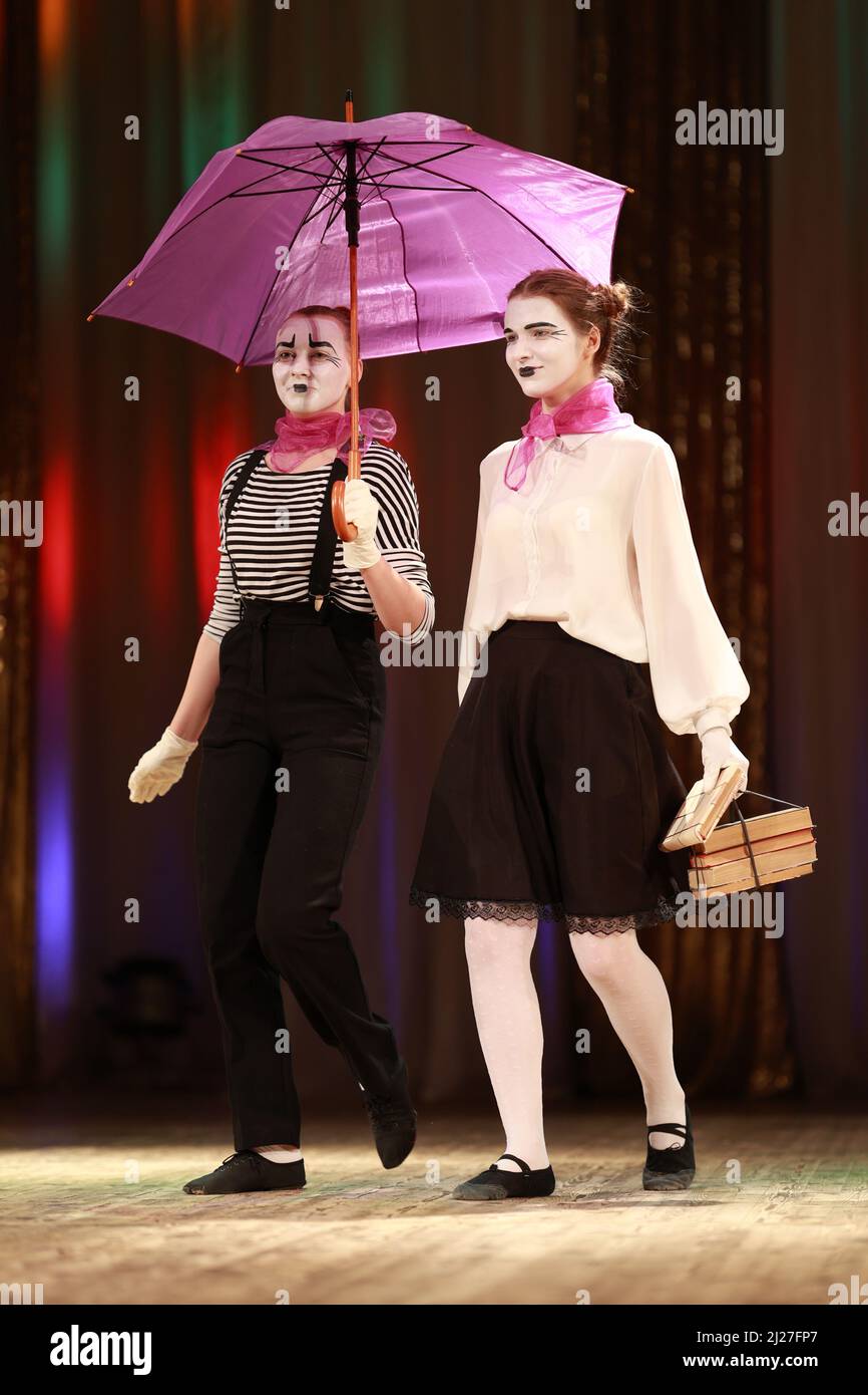 Actress girls clowns show performance on stage Stock Photo - Alamy