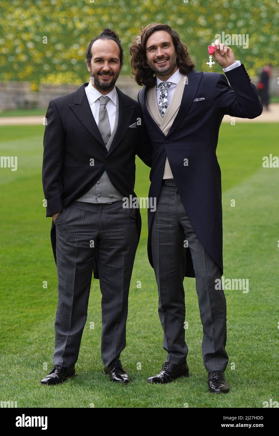 Joe Wicks (left) with his brother Nikki Wicks after receiving his MBE ...