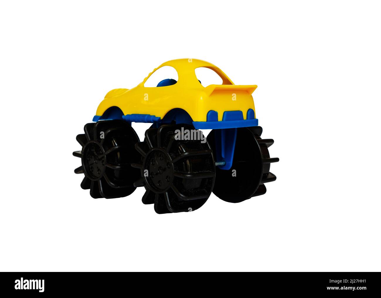 Children's yellow plastic toy car on a white background Stock Photo - Alamy
