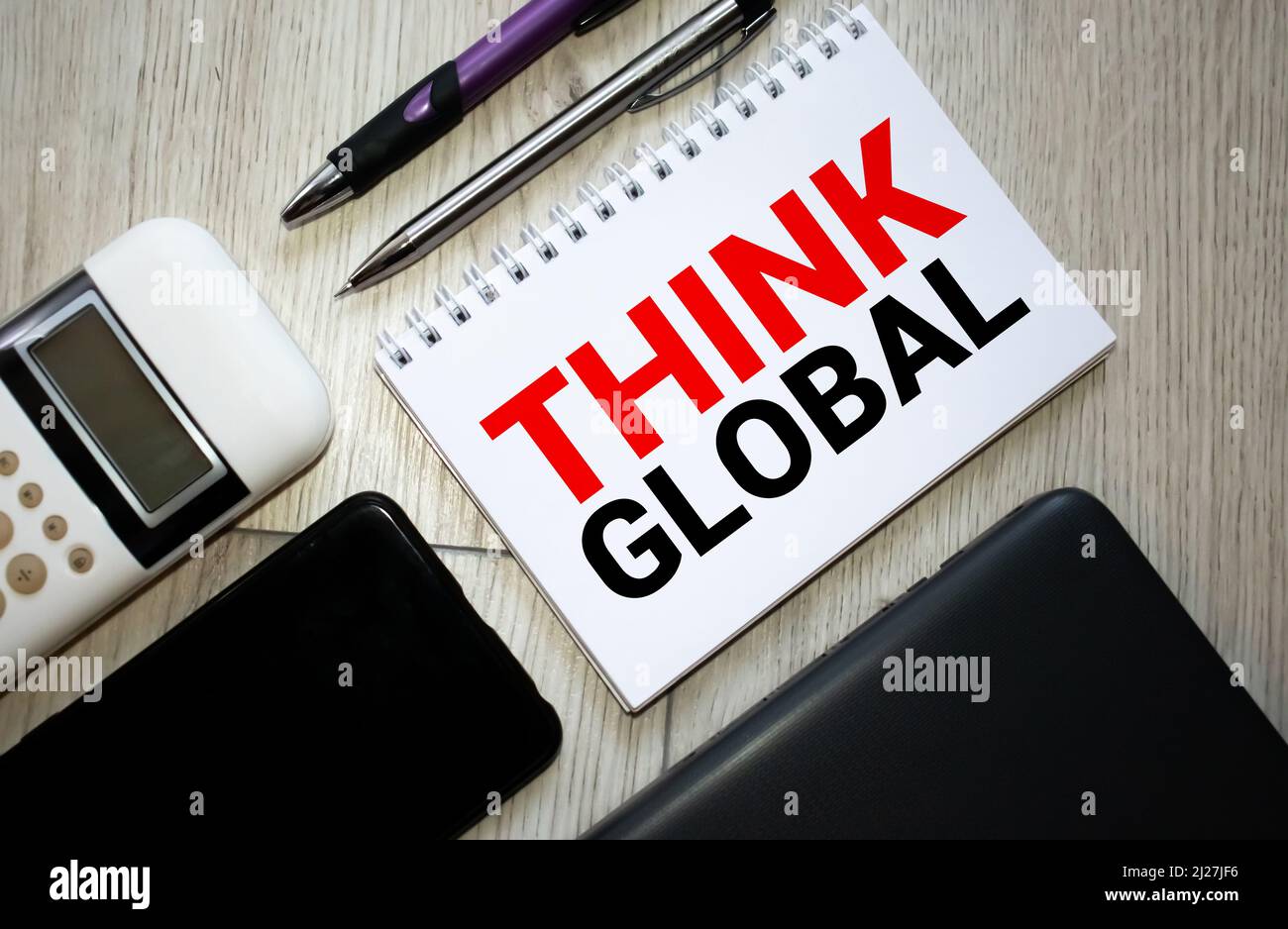 Think Global Concept, Think Global text on card Stock Photo - Alamy