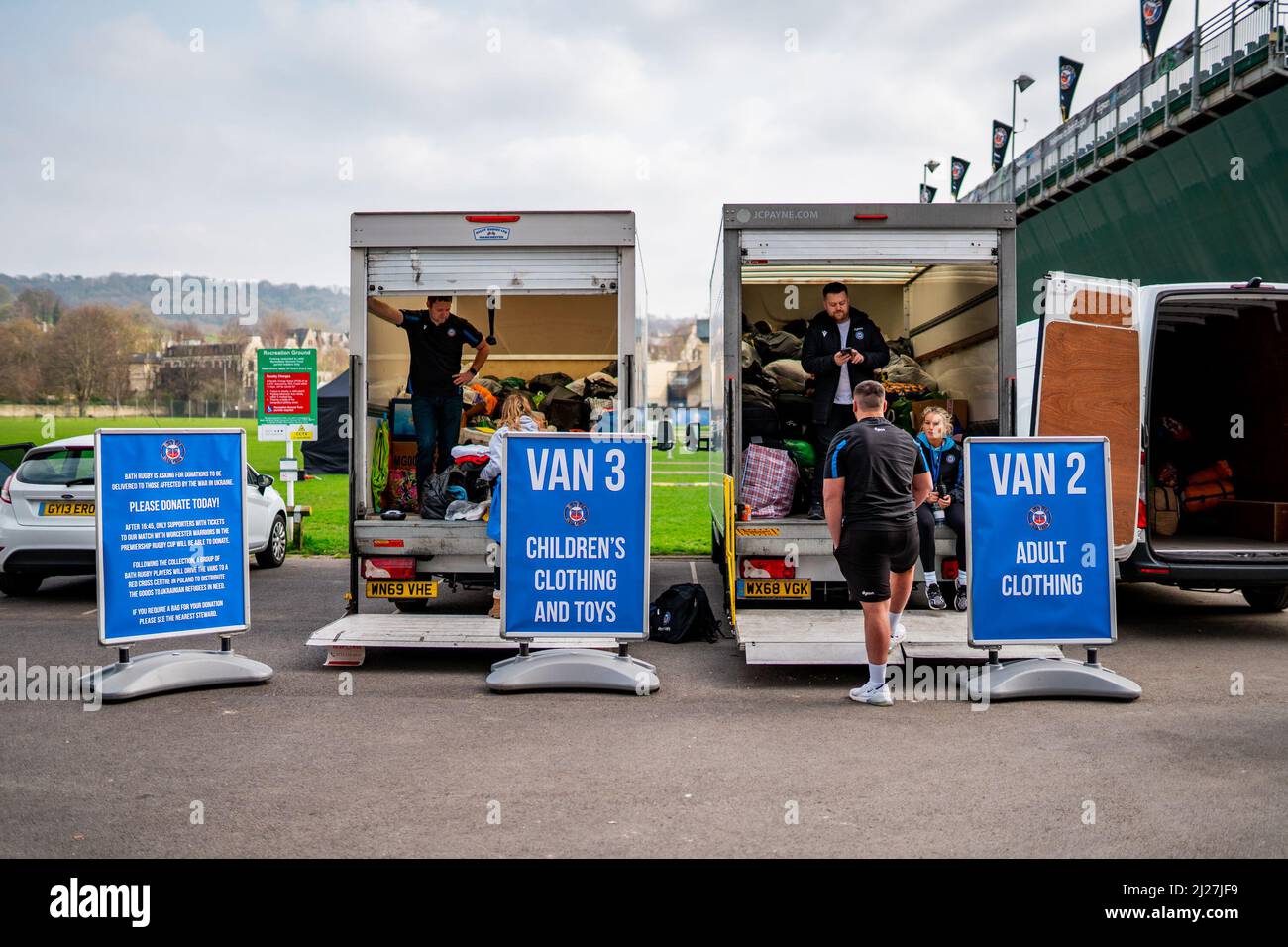 Three vans outside The Rec, Bath collect donations for Ukrainian ...