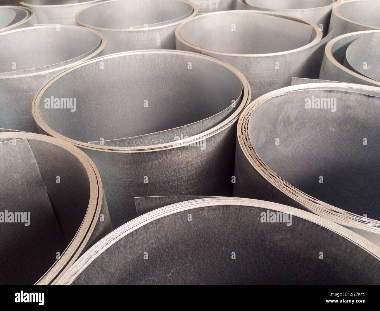Galvanized sheet metal rollers Stock Photo - Alamy