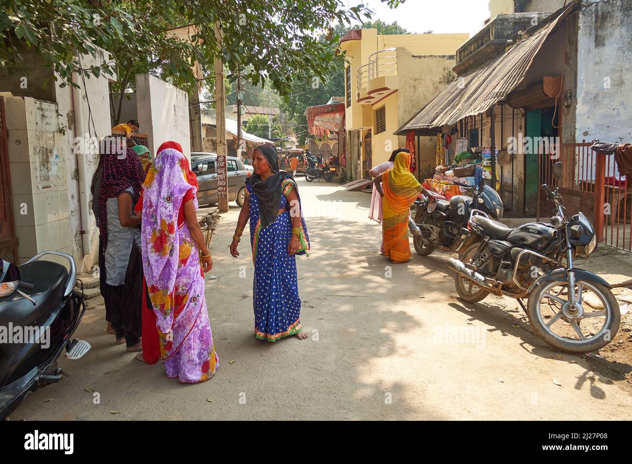Women with faces covered with traditional garments doing a ritual in ...