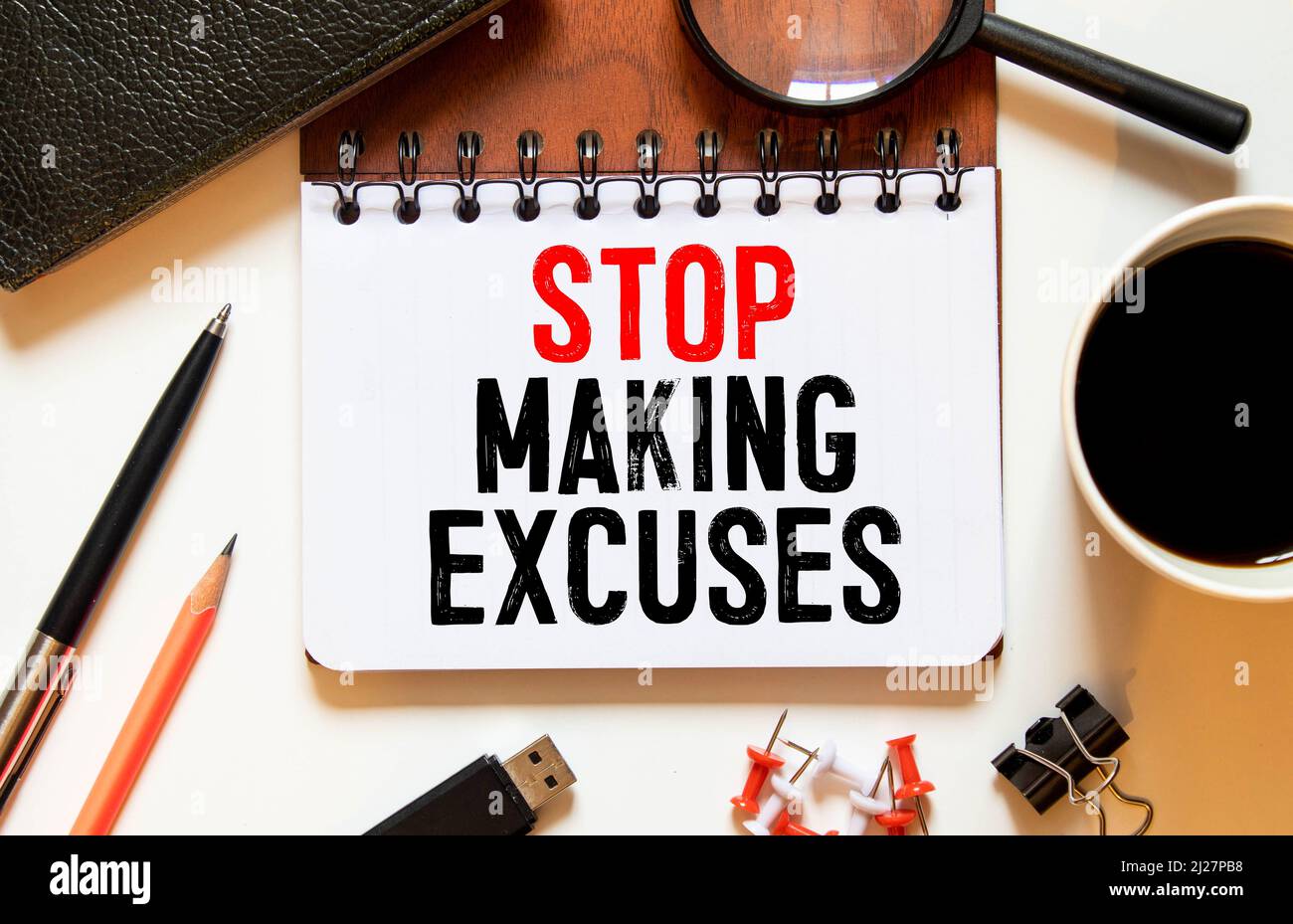 Stop Making Excuses text written on a notebook with pencils Stock Photo ...