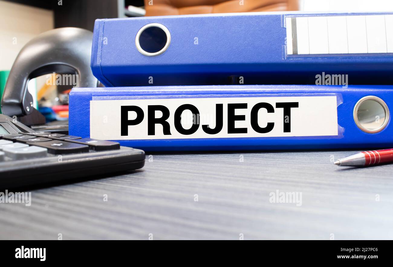 Projects words on labels with document binders Stock Photo - Alamy