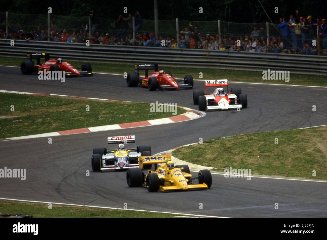 Ayrton Senna da Silva (BRA) Lotus 99T Honda 2nd position leads Nigel Mansell (GBR) Williams ...