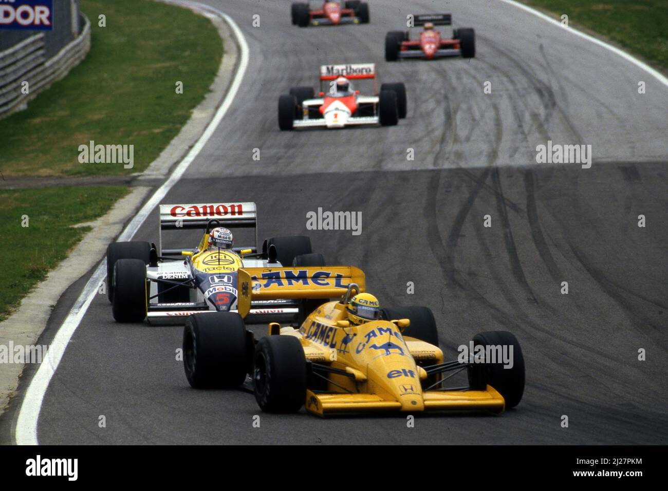 Ayrton Senna da Silva (BRA) Lotus 99T Honda 2nd position leads Nigel Mansell (GBR) Williams ...