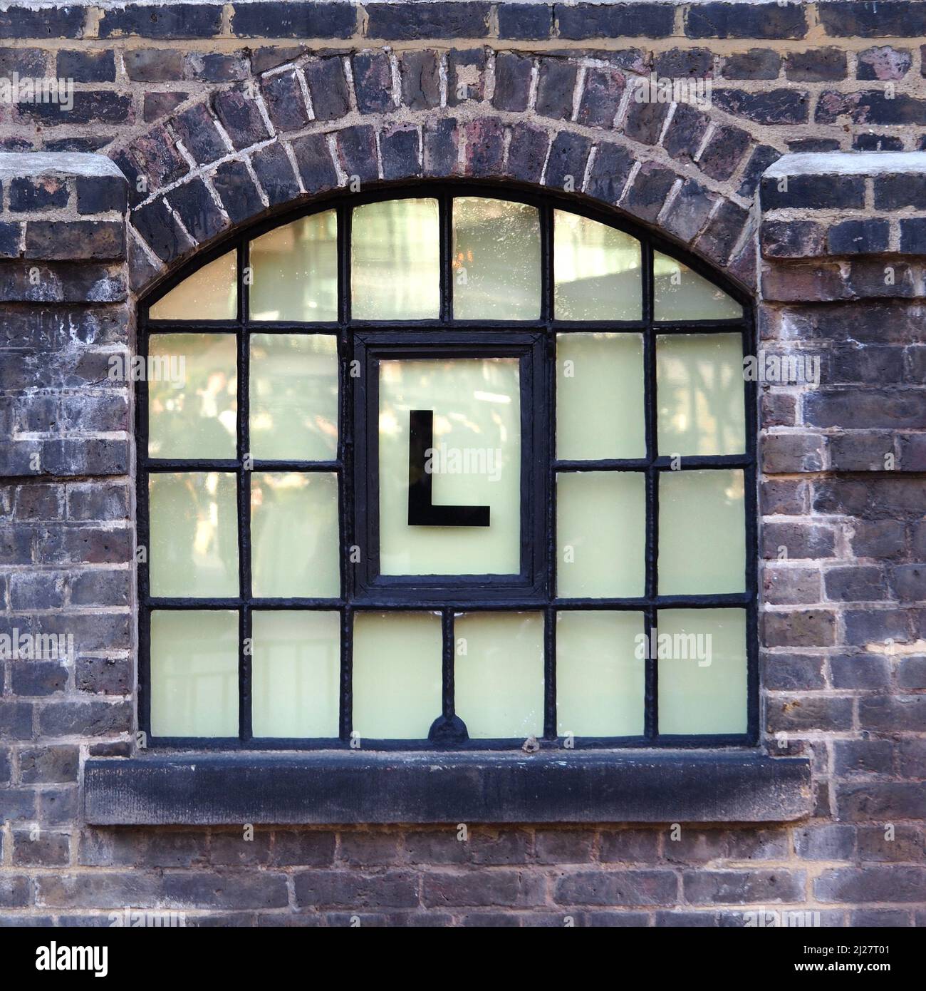 Coal Drops Yard - individual letters in coloured glass windows in old ...