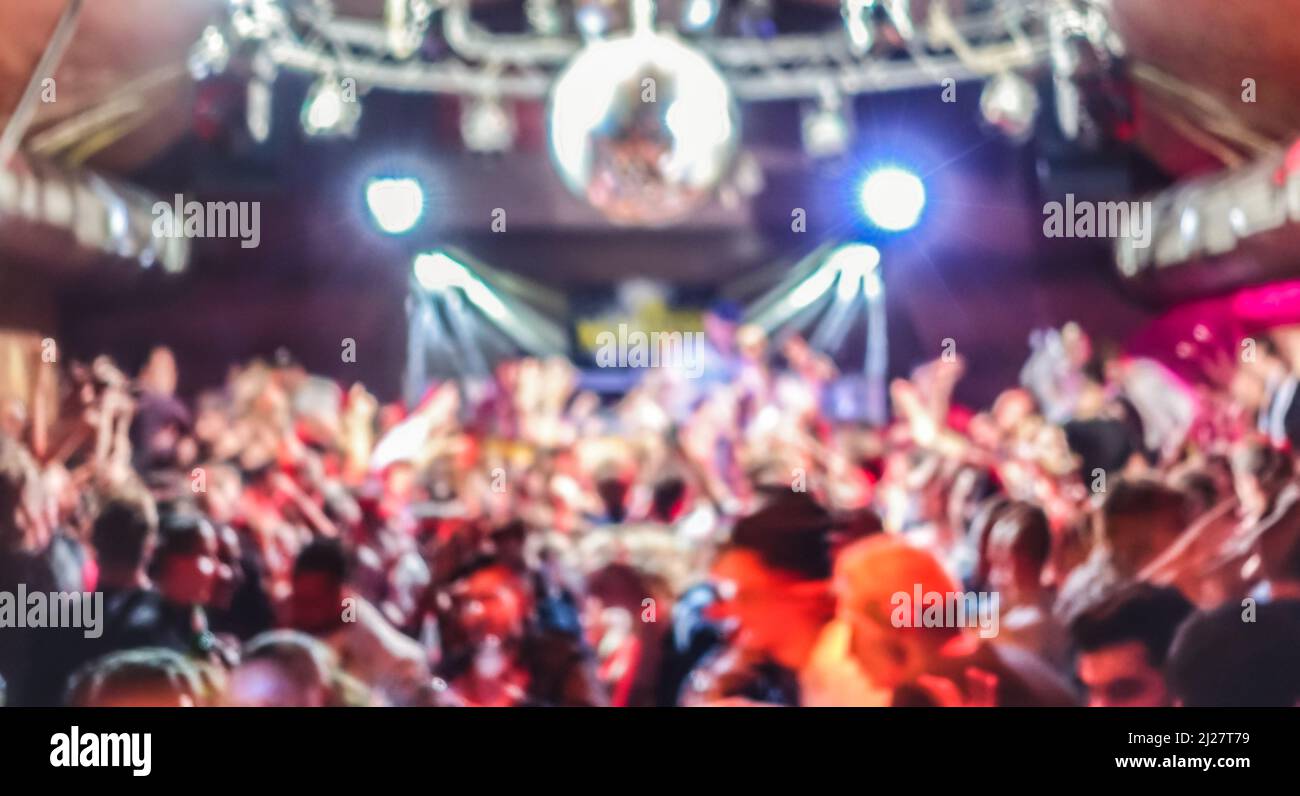 Blurred people dancing at music concert event - Abstract defocused ...