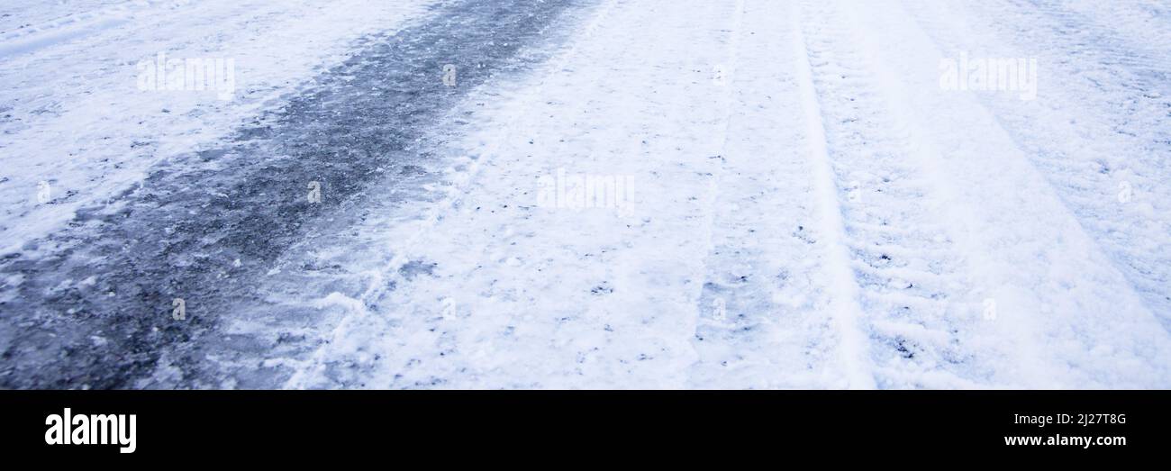 A closeup of a frozen snow floor surface on the road in winter Stock ...