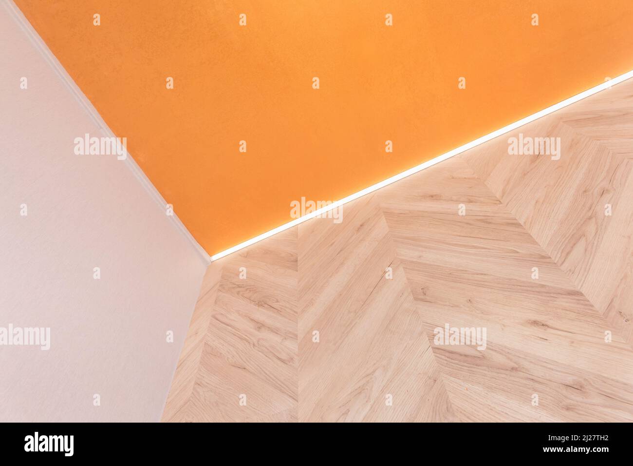 Corner of the room at the ceiling and the joint of the walls element of ...