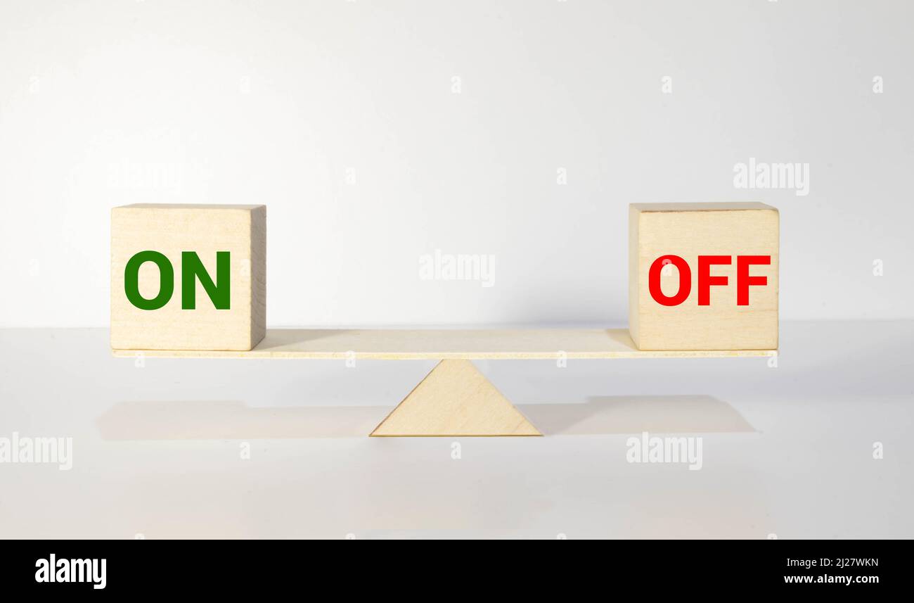 Light switch with on off word on green background Stock Photo - Alamy