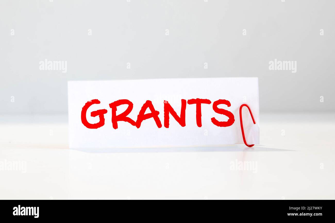 grants word on paper folder showing scholarship or higher education ...