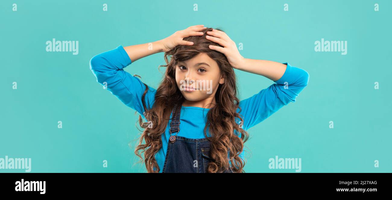 cheerful kid with curly hair. teen beauty hairstyle. female fashion ...