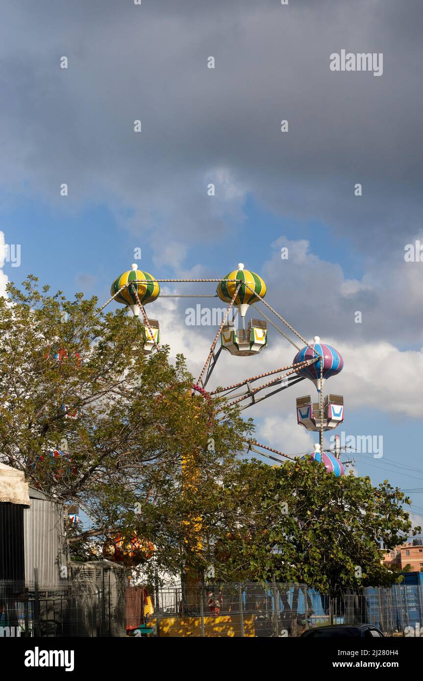 Ferris wheel spinning in amusement park Stock Photo - Alamy