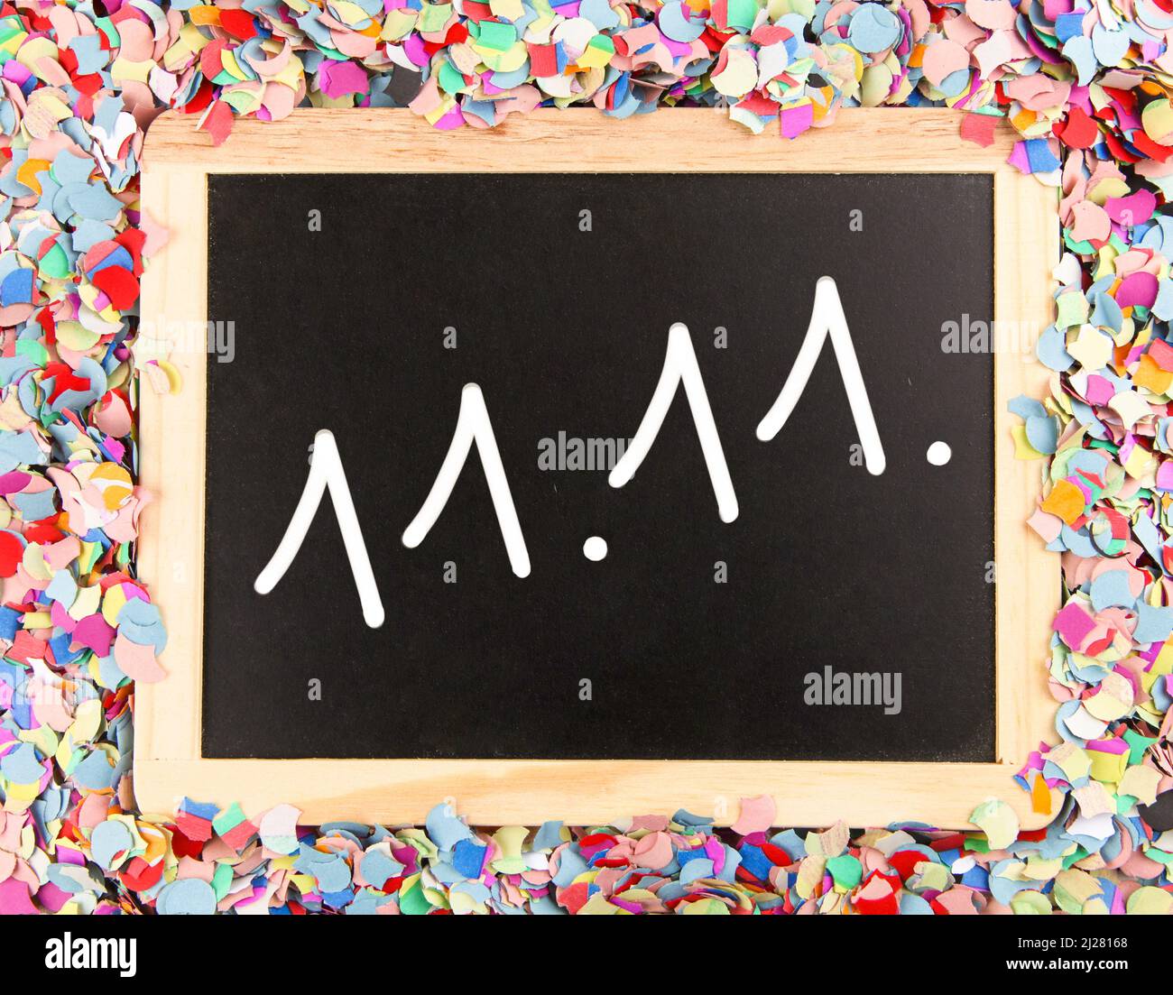 A confetti background with a wooden board with two eleven numbers Stock ...