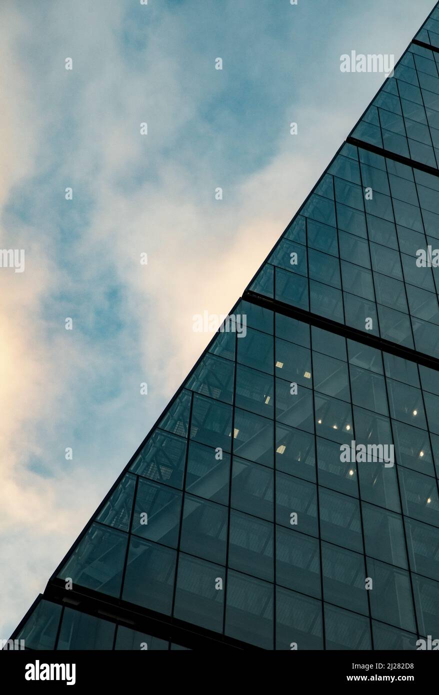 Ultra-modern skyscrapers in Aldgate, London, reflecting the cloudscape ...